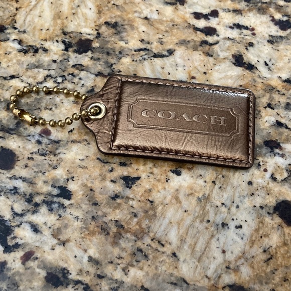 Coach | Accessories | Coach Bronze Leather Hang Tag | Poshmark